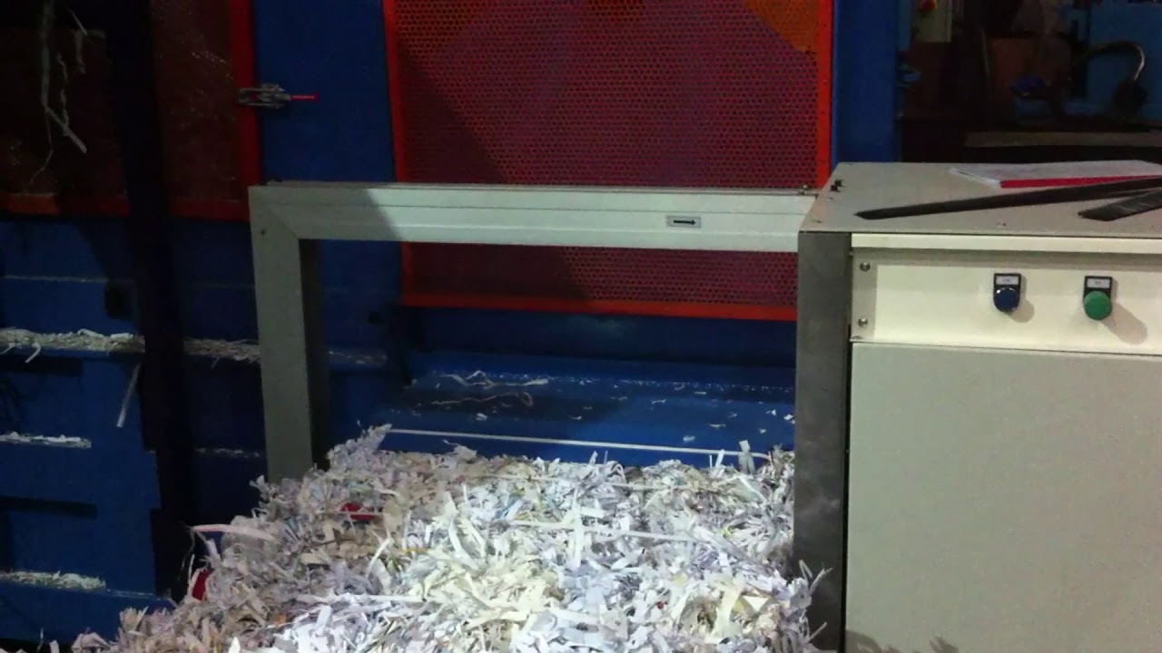 ABP Waste paper trimmings/shredded paper Strapping Baler machine - YouTube