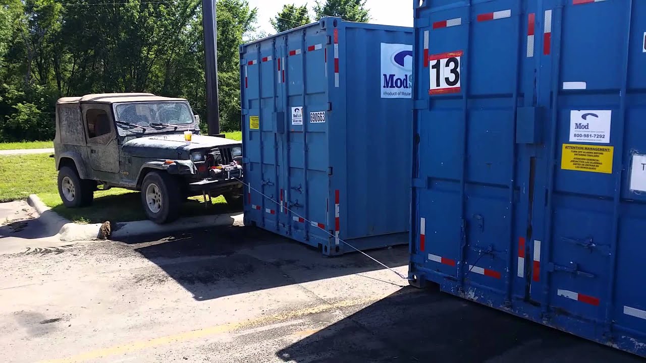 Badlands 12000lbs winch moving conex - YouTube