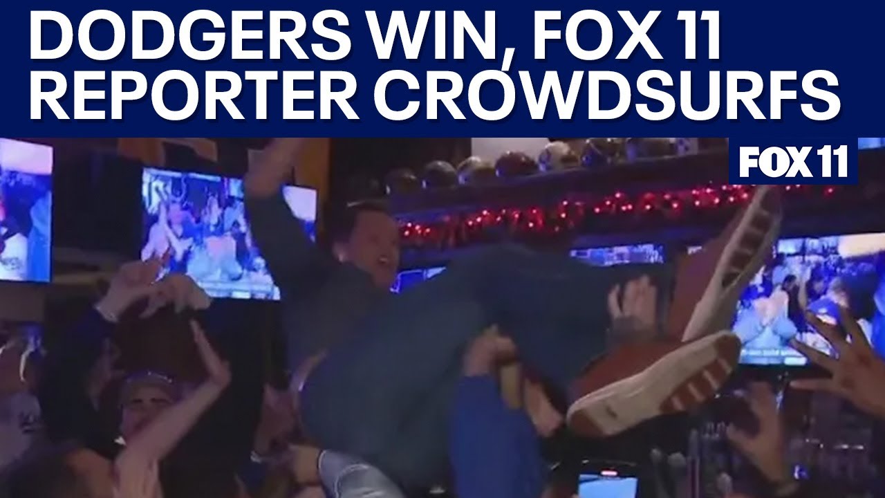 Dodgers World Series watch party gets FOX 11's Matthew Seedorff to crowd surf - YouTube