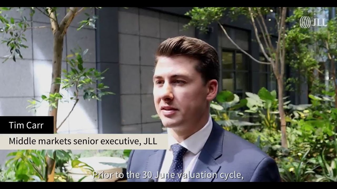 Office investment bid-to-ask gap narrows – Tim Carr, JLL - YouTube