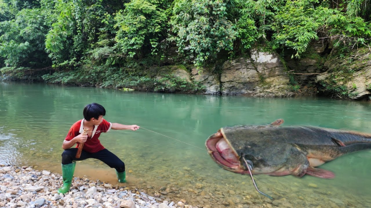 The boy Lam caught a big fish in the big stream. - YouTube