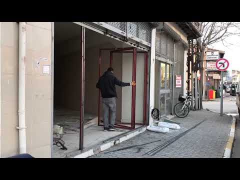 sürmeli katlanir demir vitrin cami