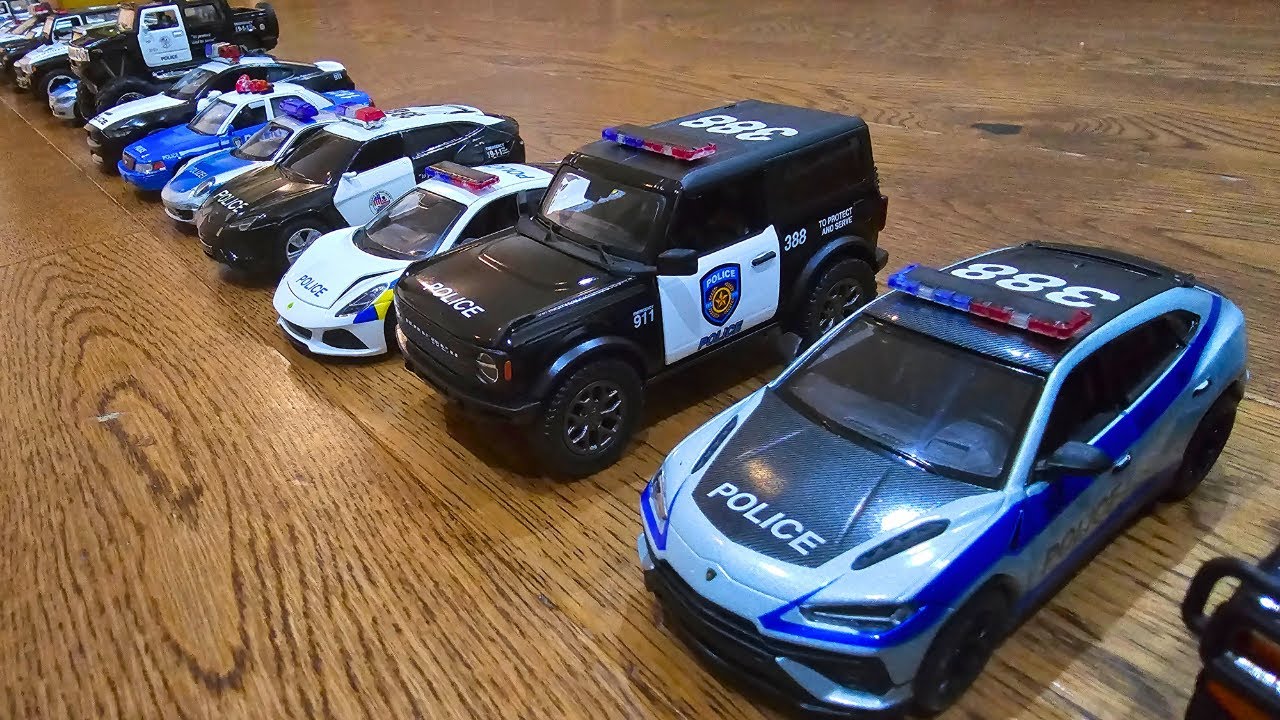 Police cars moving on the floor and parking in line next to each other ...