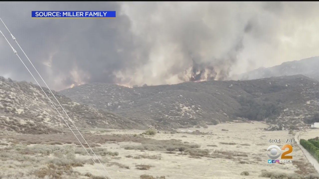Rain soaks dry brush and slows flames of Fairview Fire - YouTube