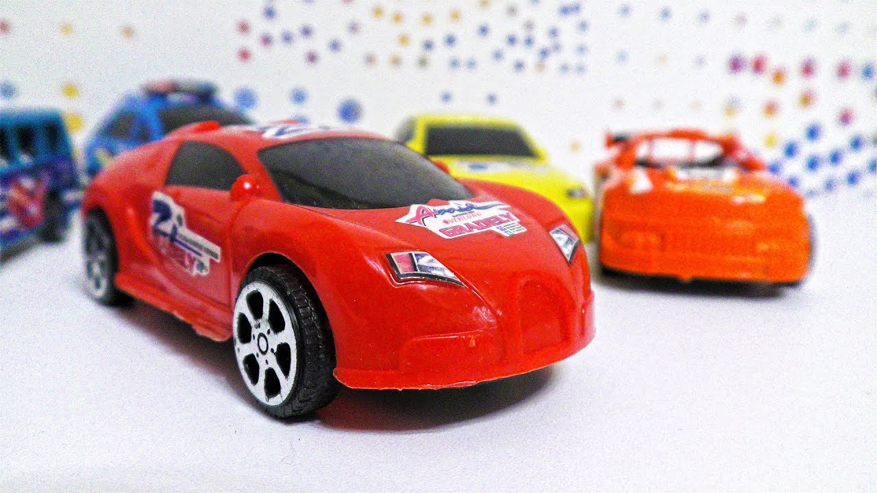Plastic Cars of Various Colors Moving on My Desk - YouTube
