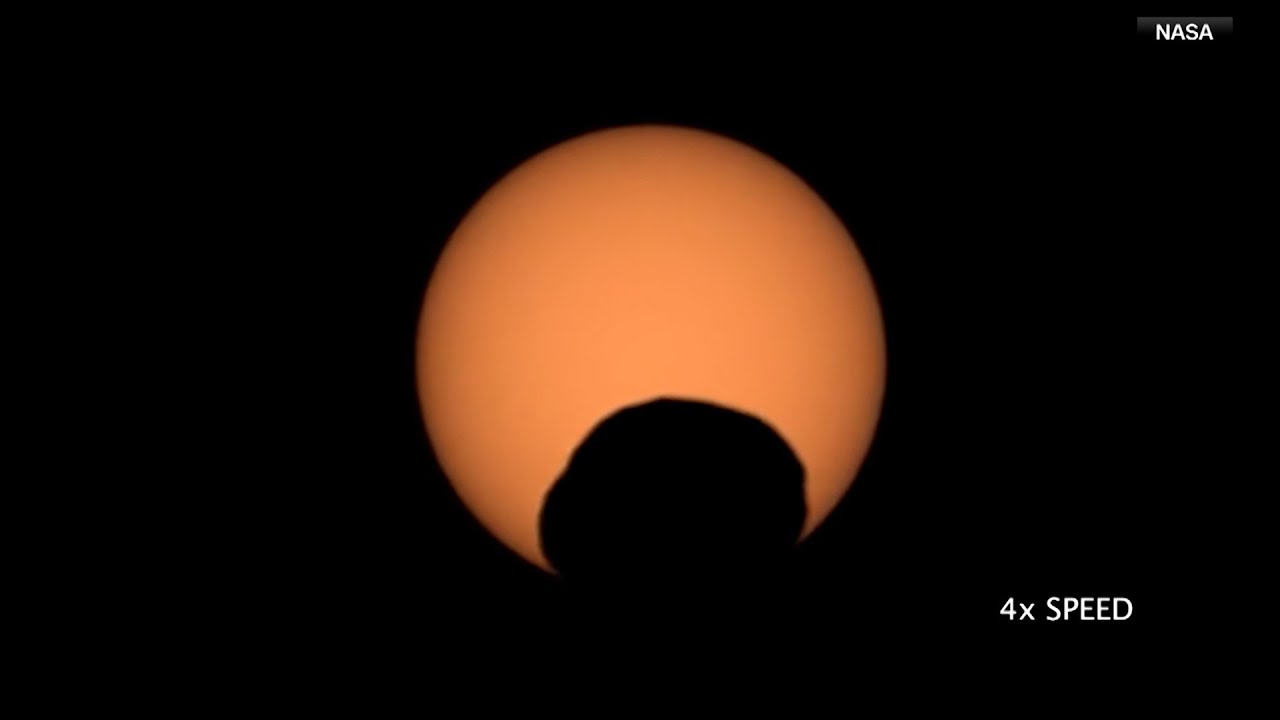 Video of the Day: Mars rover catches "googly-eye" eclipse - YouTube