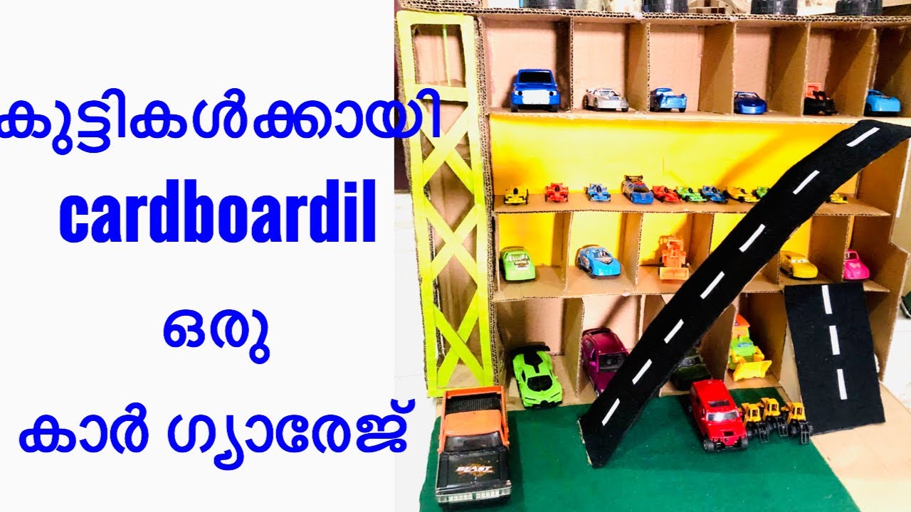 DIYcardboard car garage with play mat & working lift/lockdown activity ...