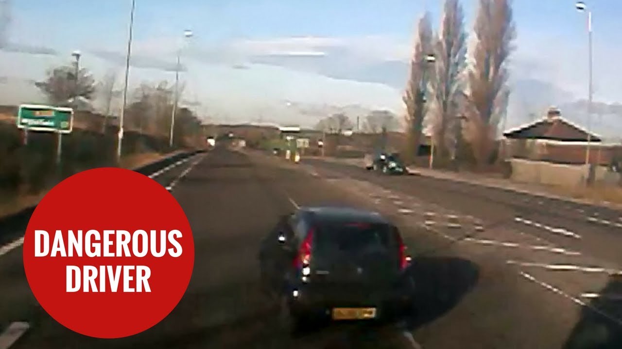 Dramatic dash cam captures car cutting up lorry with inches to spare ...