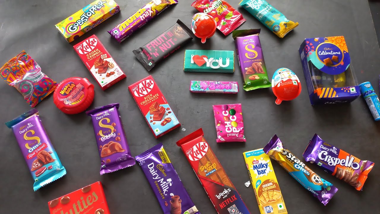 Lots of candies, surprise toys, chocolate opening video, lots of ...