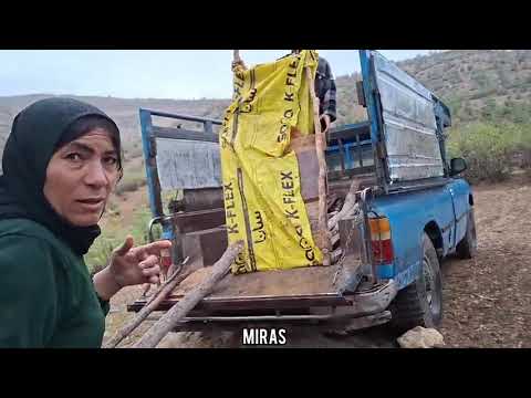ALONE in the Rain: Homeless Mom Carries Wood for Her Roof