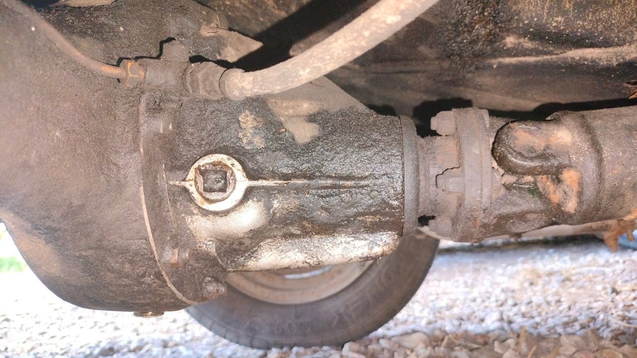 Morris Minor Level 3: Checking and topping up the differential oil on a ...