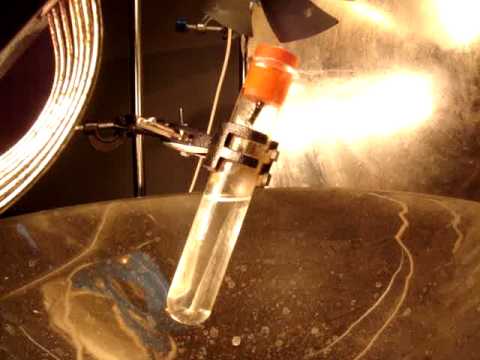 Heating water in the boiling tube - YouTube
