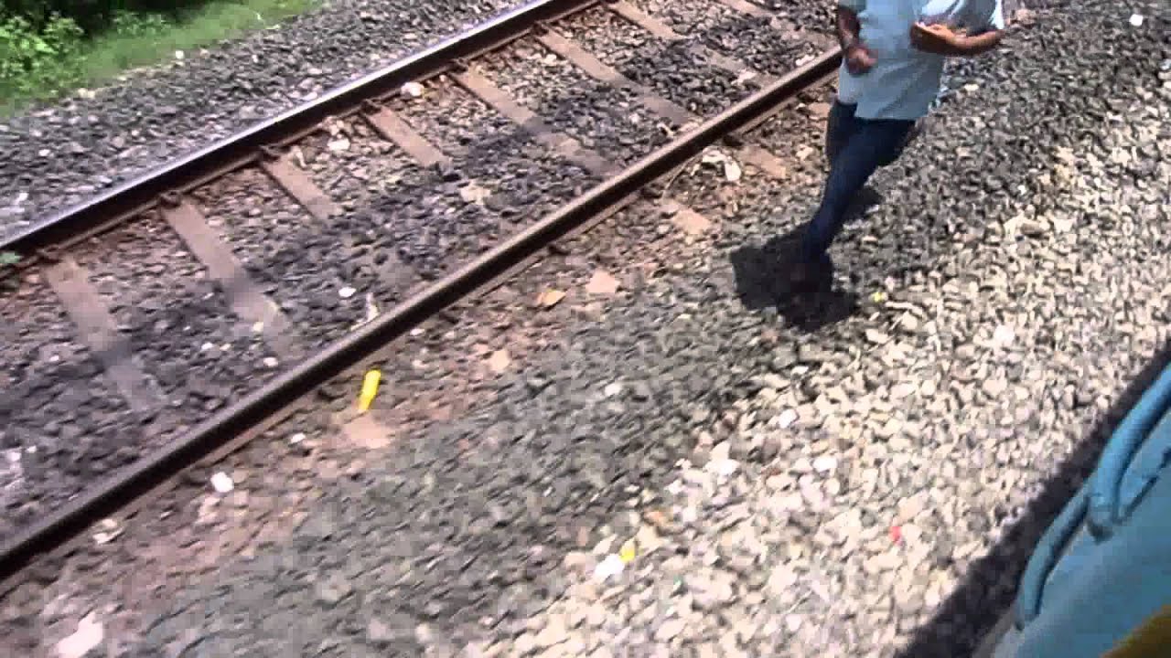 THIS WILL HAPPEN ONLY IN INDIA : MAN JUMPS OUT OF MOVING TRAIN [Full HD ...