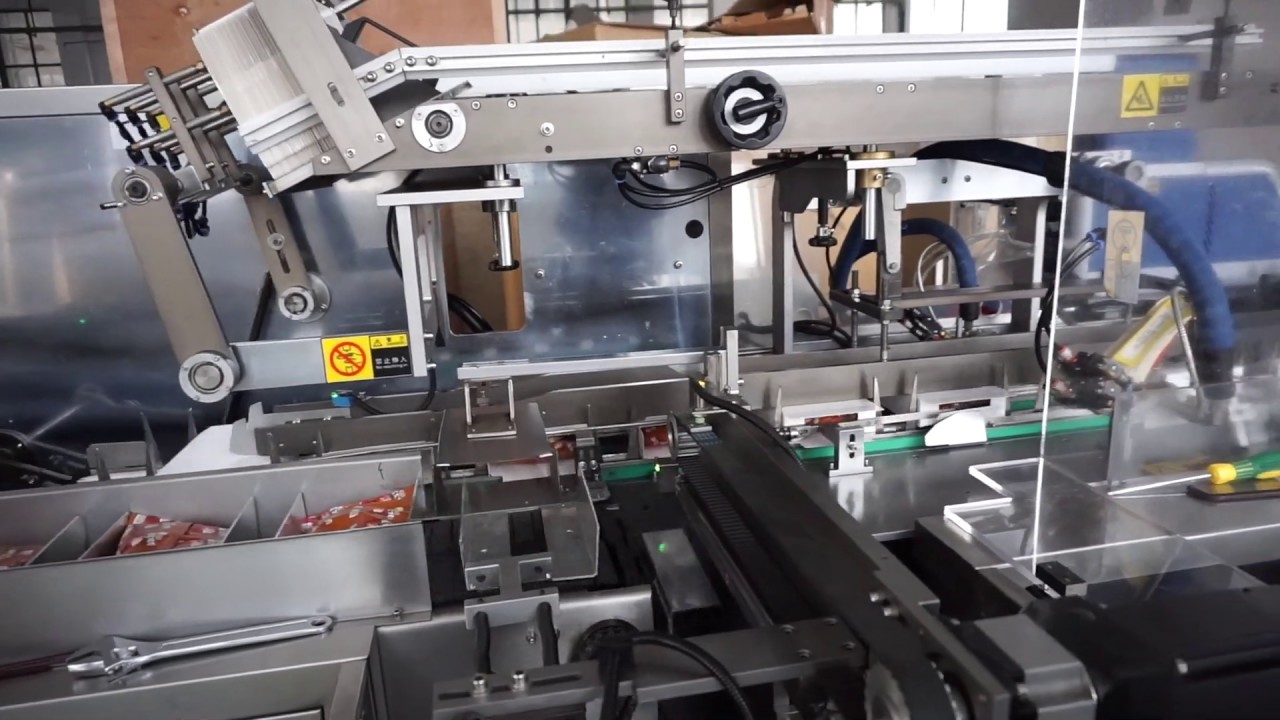 automatic food cartoning/boxing machine - YouTube