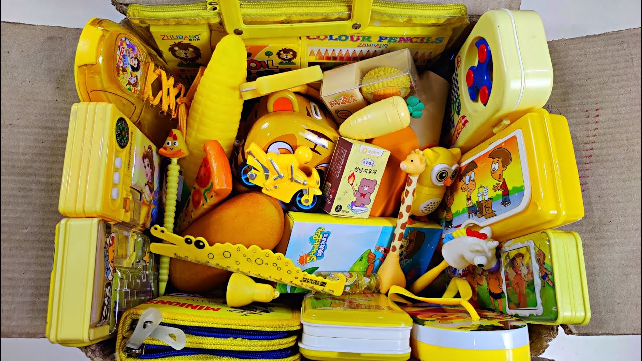 Box full of amazing yellow stationery items, pencil case, matchbox ...