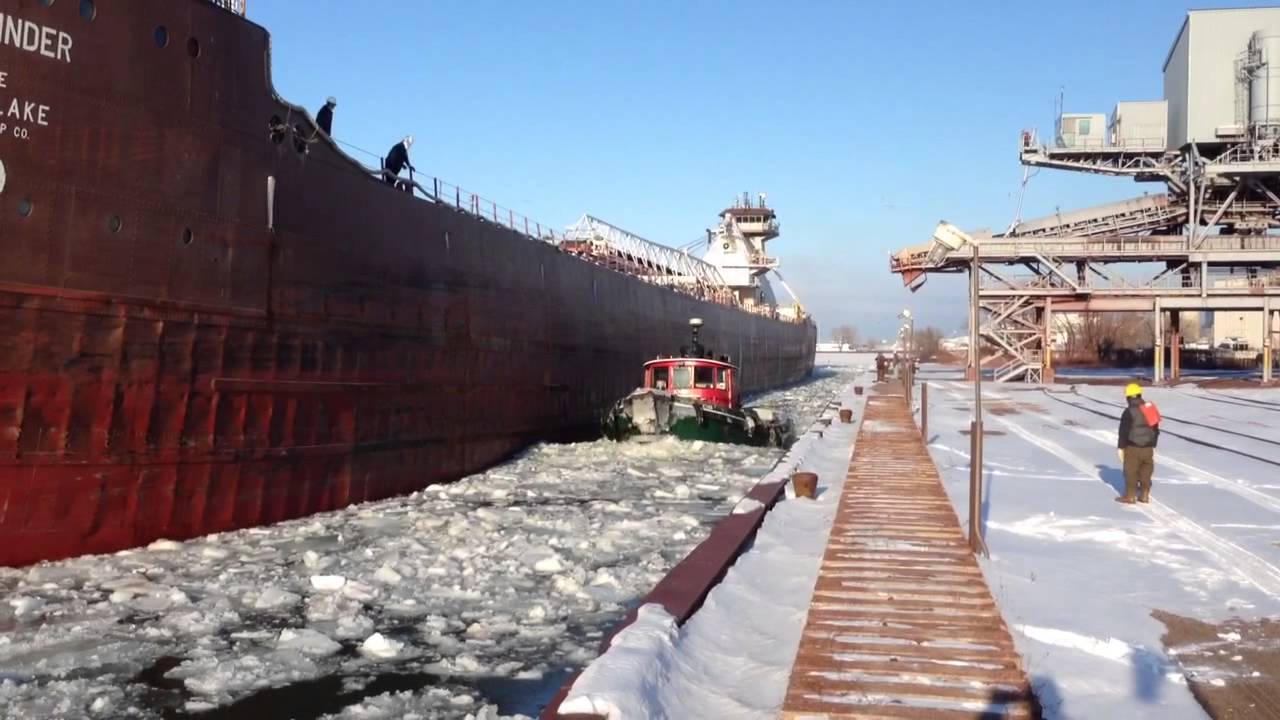 Tug clearing ice at the Dock - YouTube