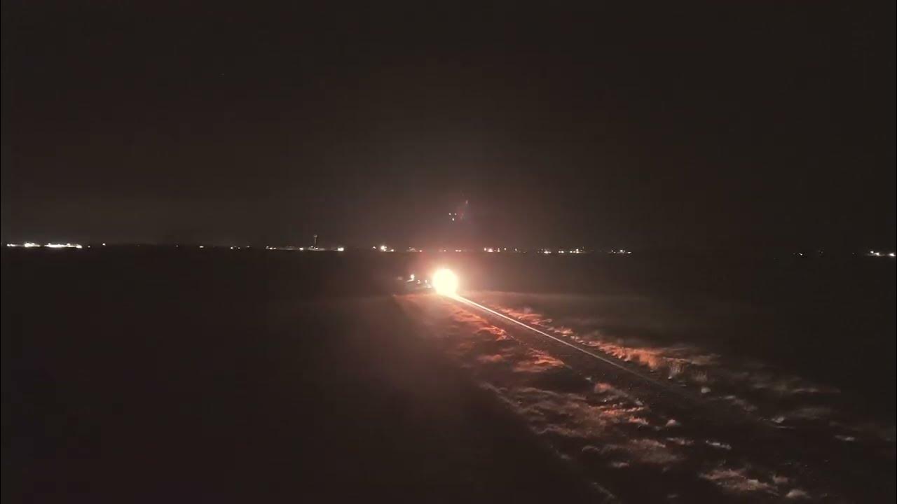 Drone video of southbound UP train at night on the Spine Line - YouTube