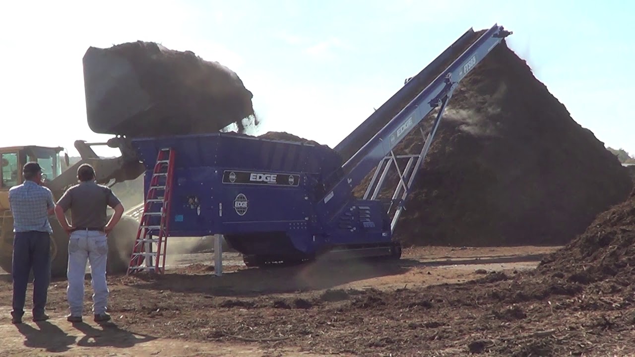 EDGE FTS Mulch Master Feeder Tracked Stacker. - YouTube