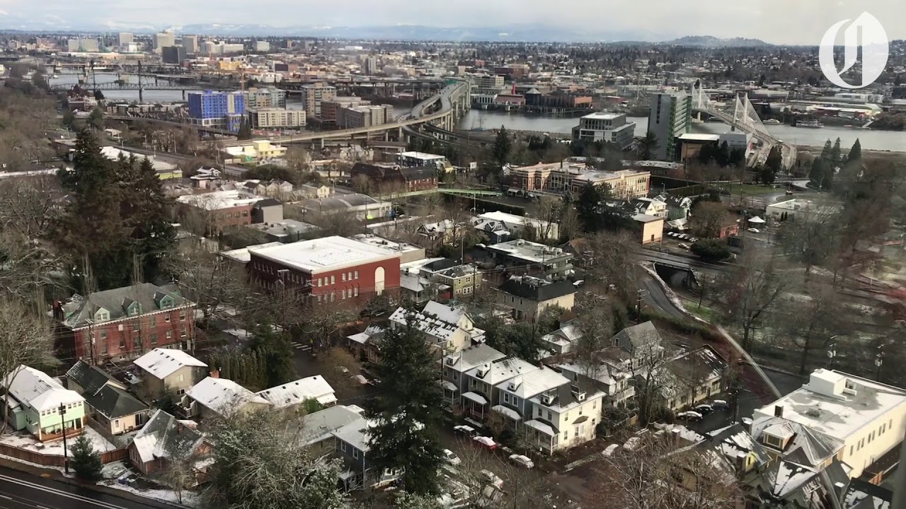 OHSU aerial tram view of snow over South Waterfront Portland - YouTube
