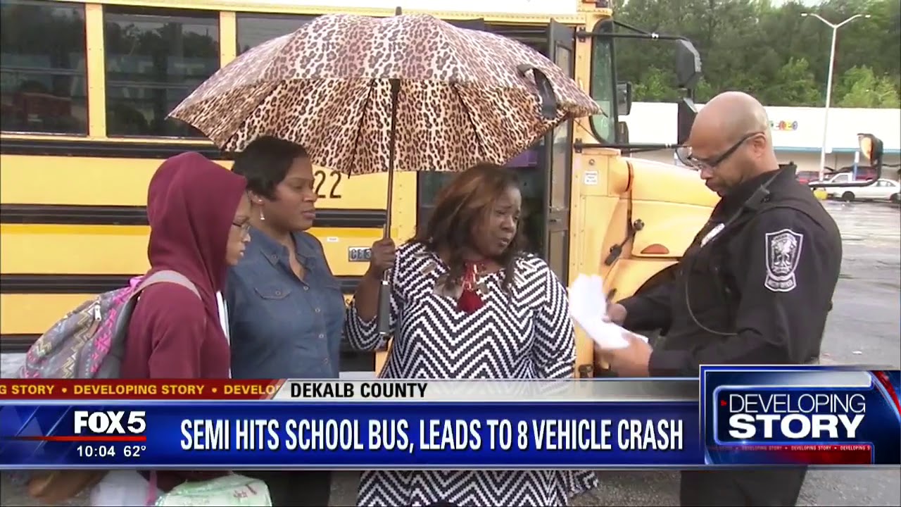 Semi hits school bus, leads to 8 vehicle crash - YouTube