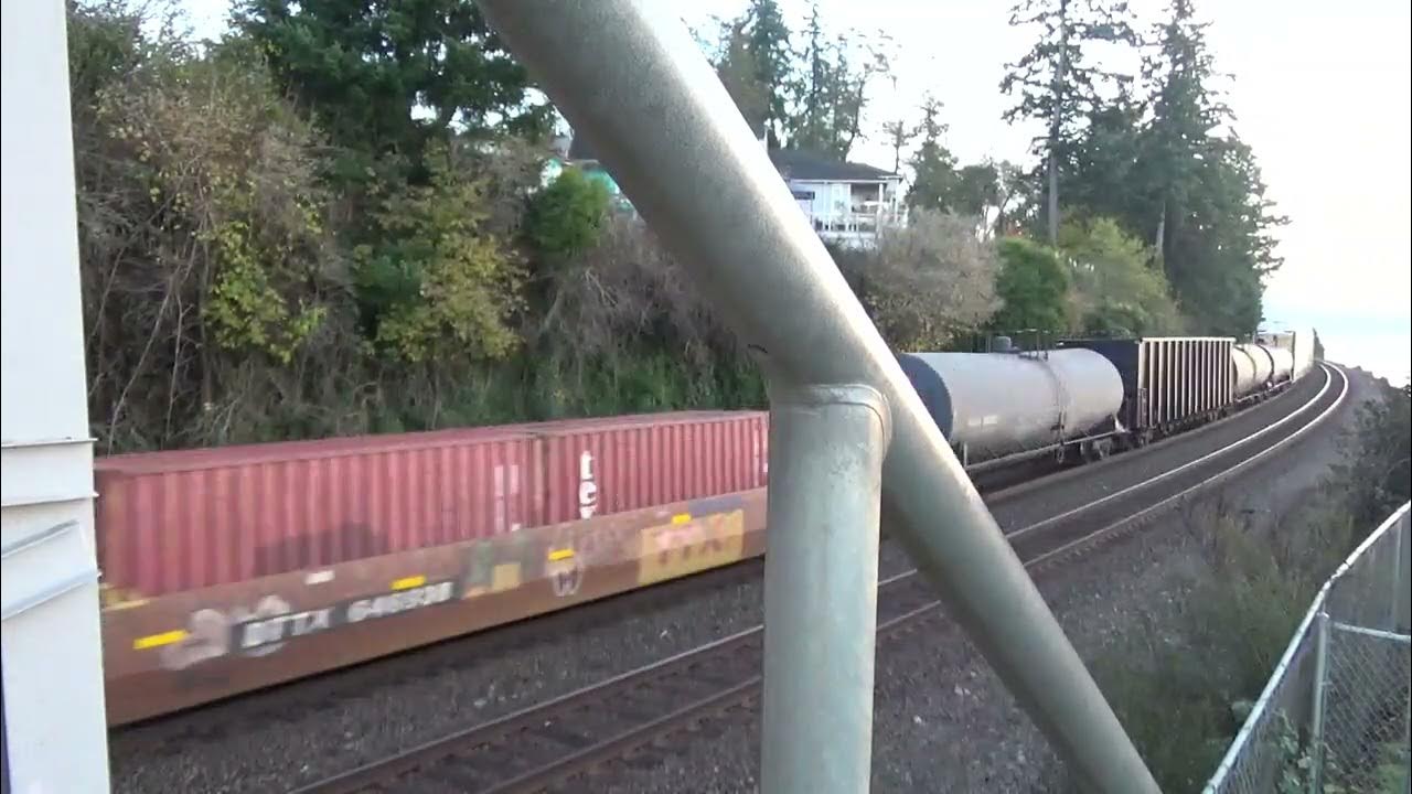 (Northbound) Union Pacific Mixed Freight Train passes through Saltar's Point Beach. - YouTube