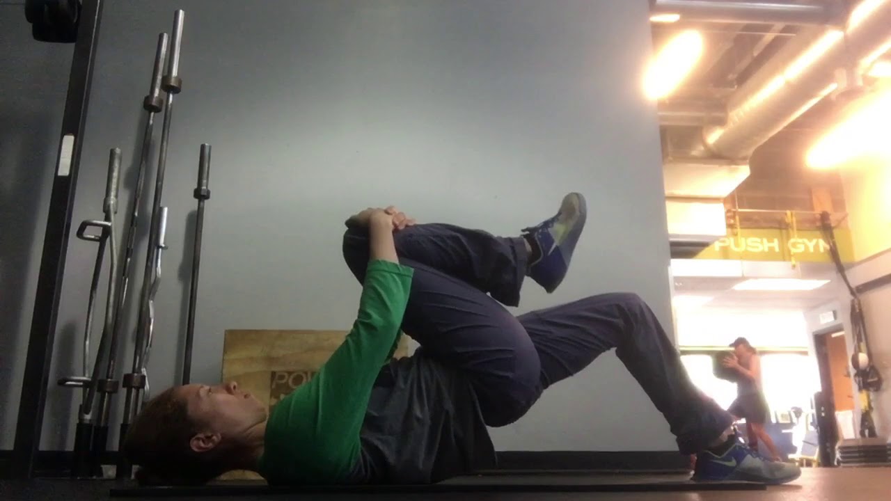 Single leg knee hug glute bridge - YouTube
