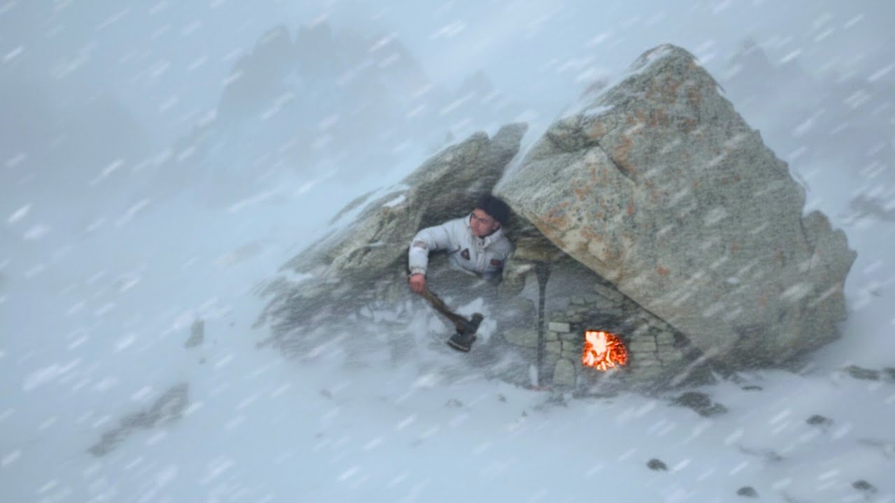 Caught in winter blizzard/building a warm and cozy shelter in snowstorm ...