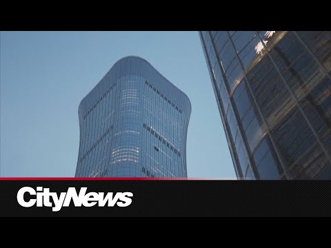 Small plane hits tallest building in Beijing