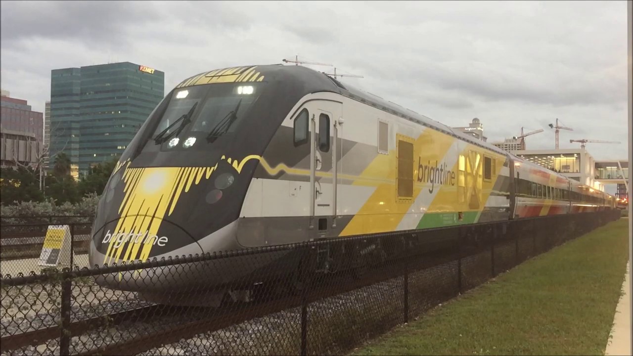 Brightline Polar express train Departs FTL station - YouTube