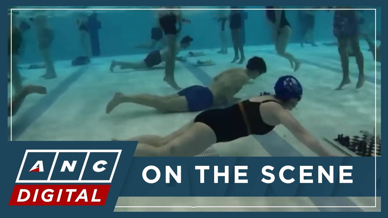 Chess players hold breath as they compete underwater in Diving Chess ...