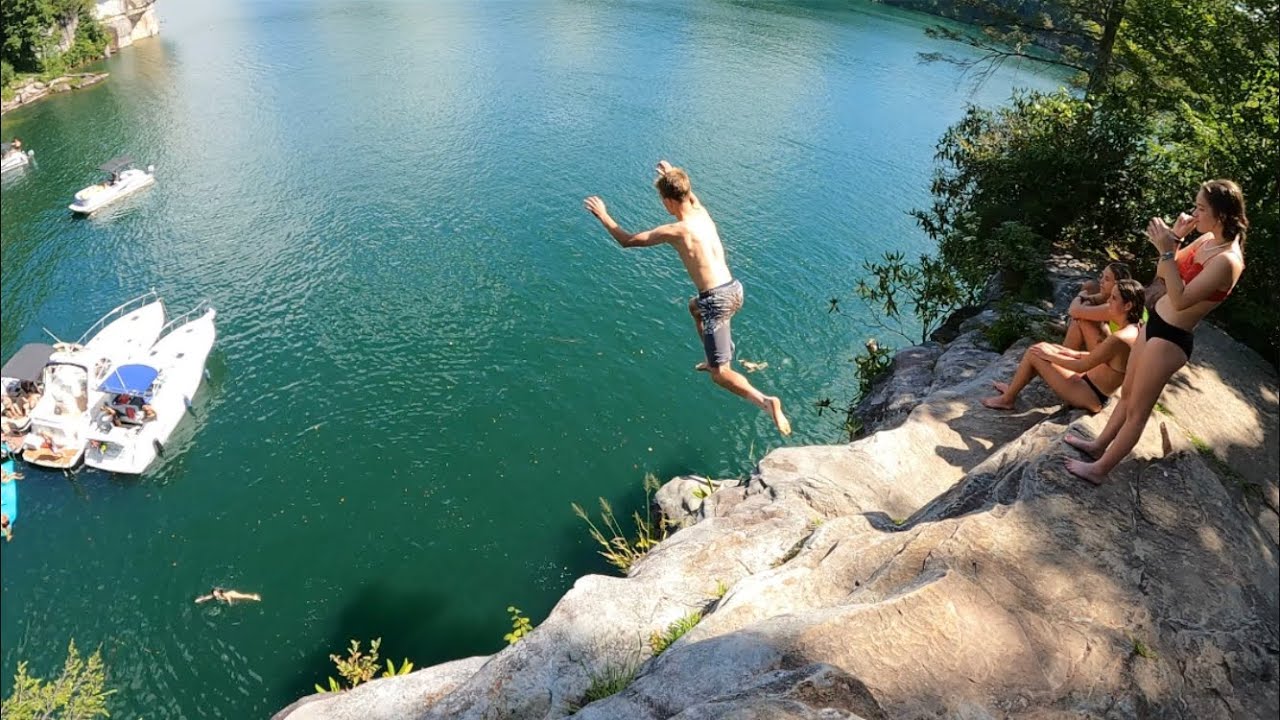 MASSIVE 60 FOOT ROCK JUMP!! - YouTube