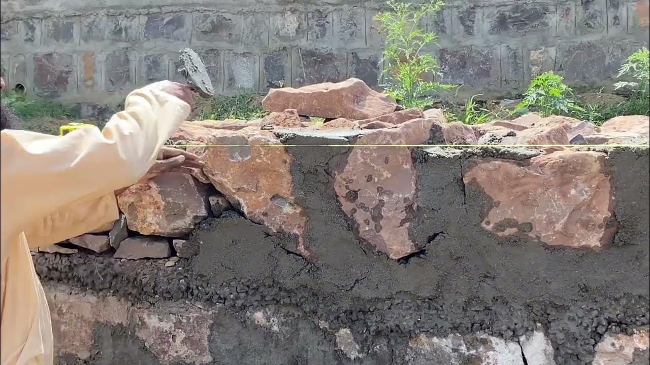 Building Stone Retaining Wall - YouTube