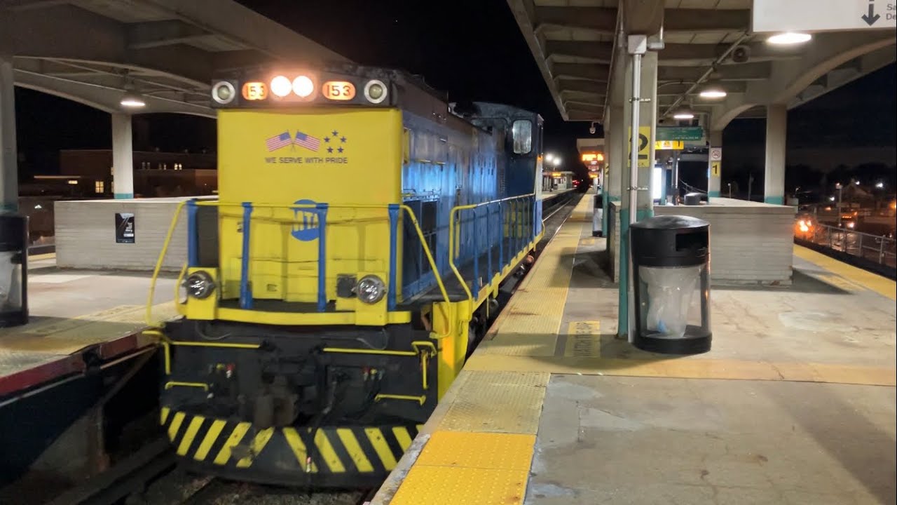 LIRR MP15AC 153 heads east thru Babylon station - YouTube