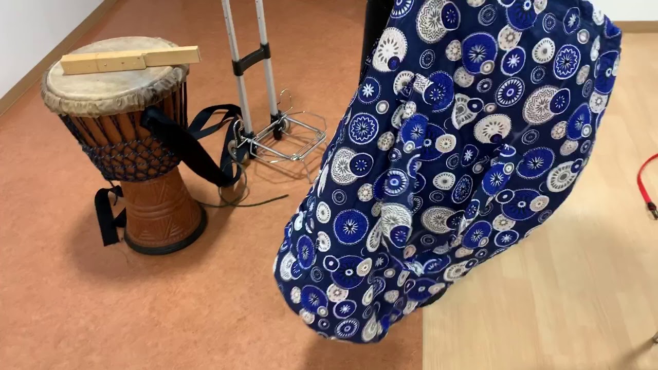 Interesting djembe bag and a puller (an instrument for replacing the ...