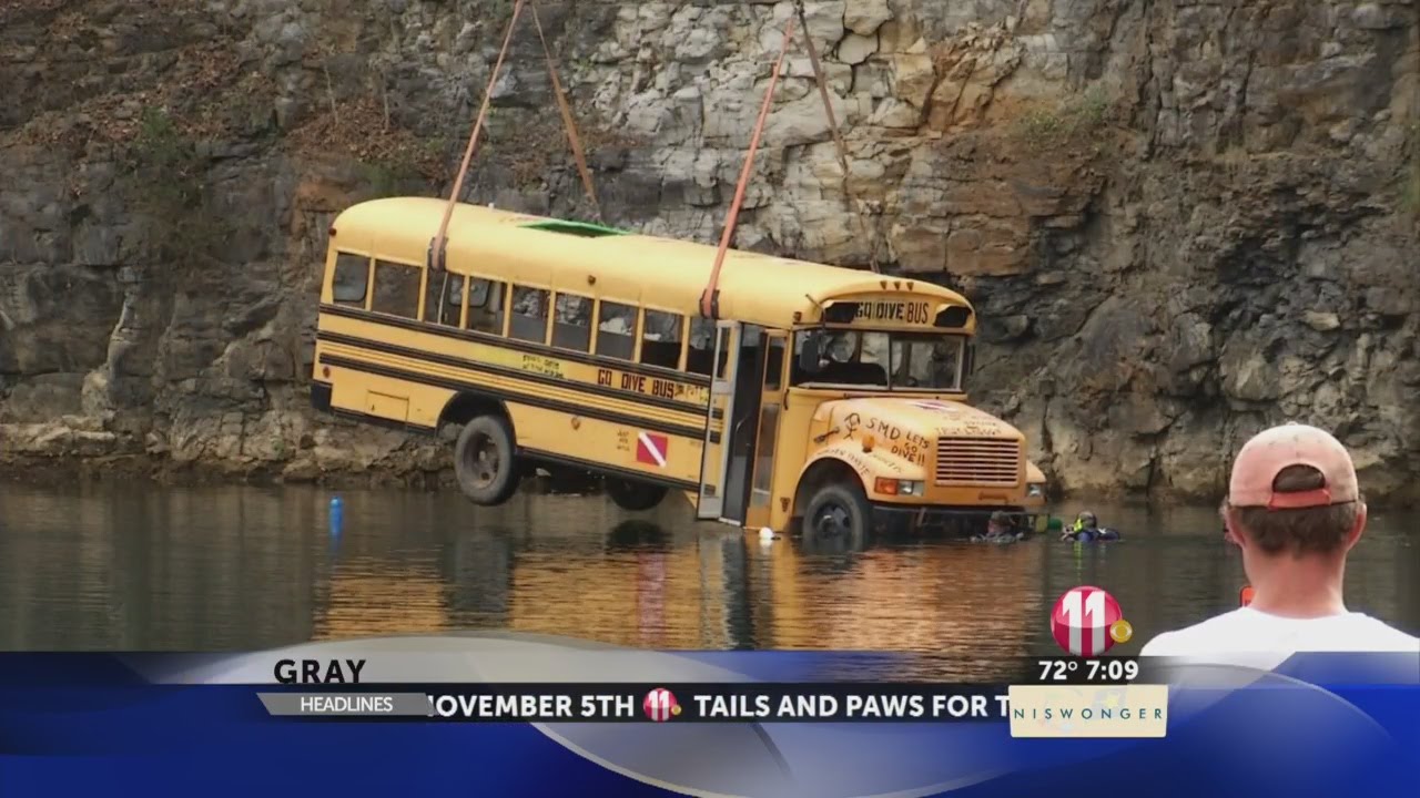 Quarry sinks school bus - YouTube