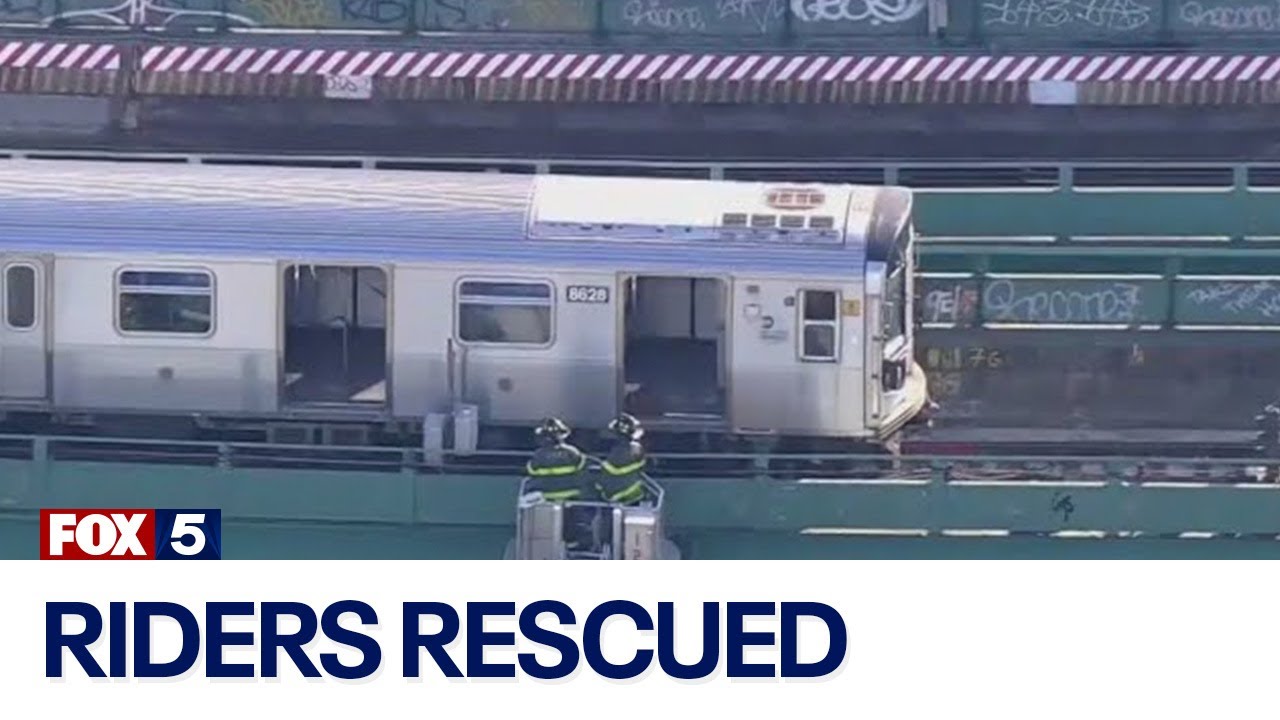 FDNY rescues riders from disabled subway train on elevated track in ...