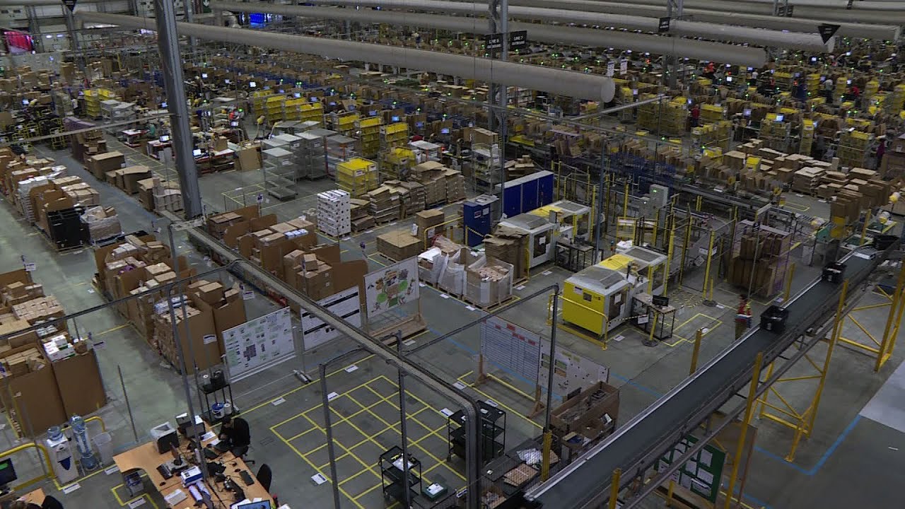 Amazon workforce surges for holiday spree | AFP - YouTube
