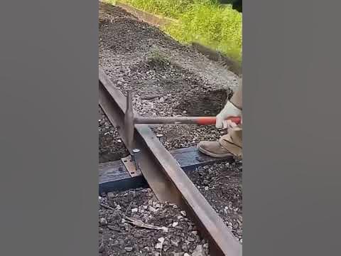 hammering 🔨 the iron bolts in railway 🚃 tracks. absolutely amazing - YouTube