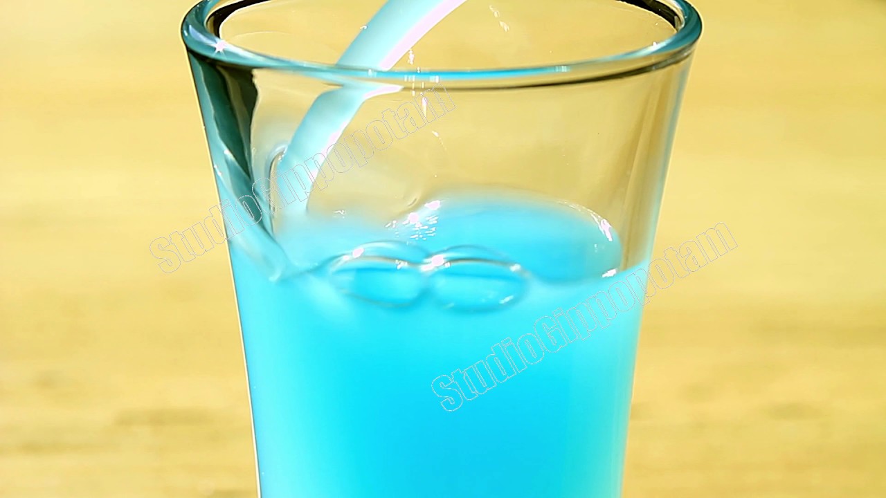 pouring liquor into a glass - YouTube