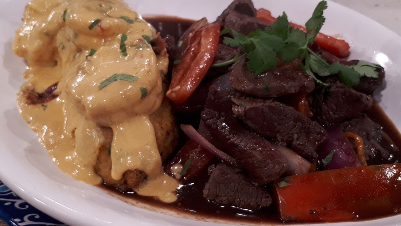Lomo a lo macho con salsa huancaína - YouTube