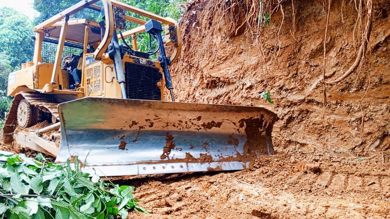 Watch the D6R XL Bulldozer Engraving Path in the Forest Break New Roads ...