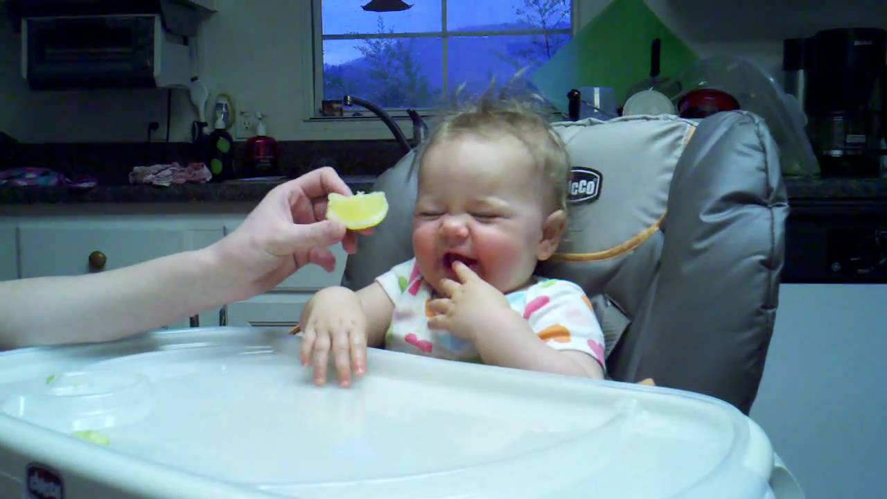 Baby eating lemon - YouTube