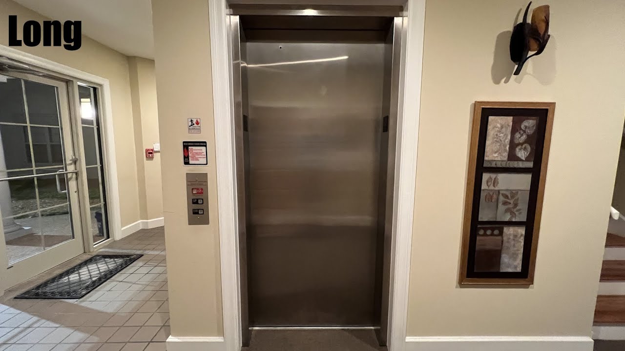 Two Newer Long Hydraulic Elevators at an Apartment Building in St ...