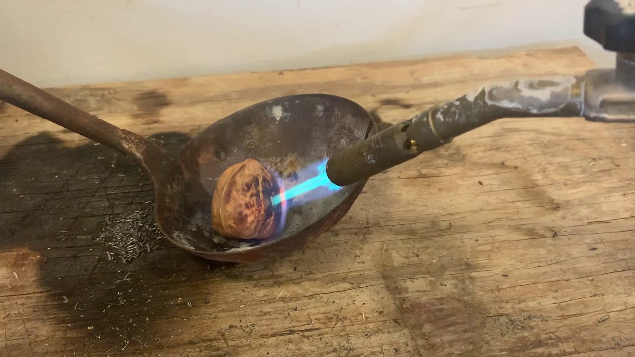Burning a walnut with a blowtorch - YouTube