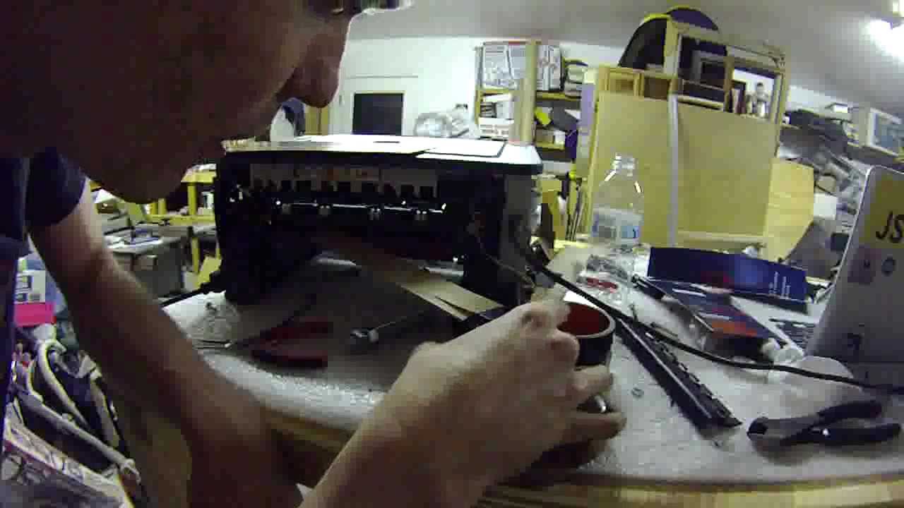 hacked laser printer: defeat switch with duct tape and shims - YouTube