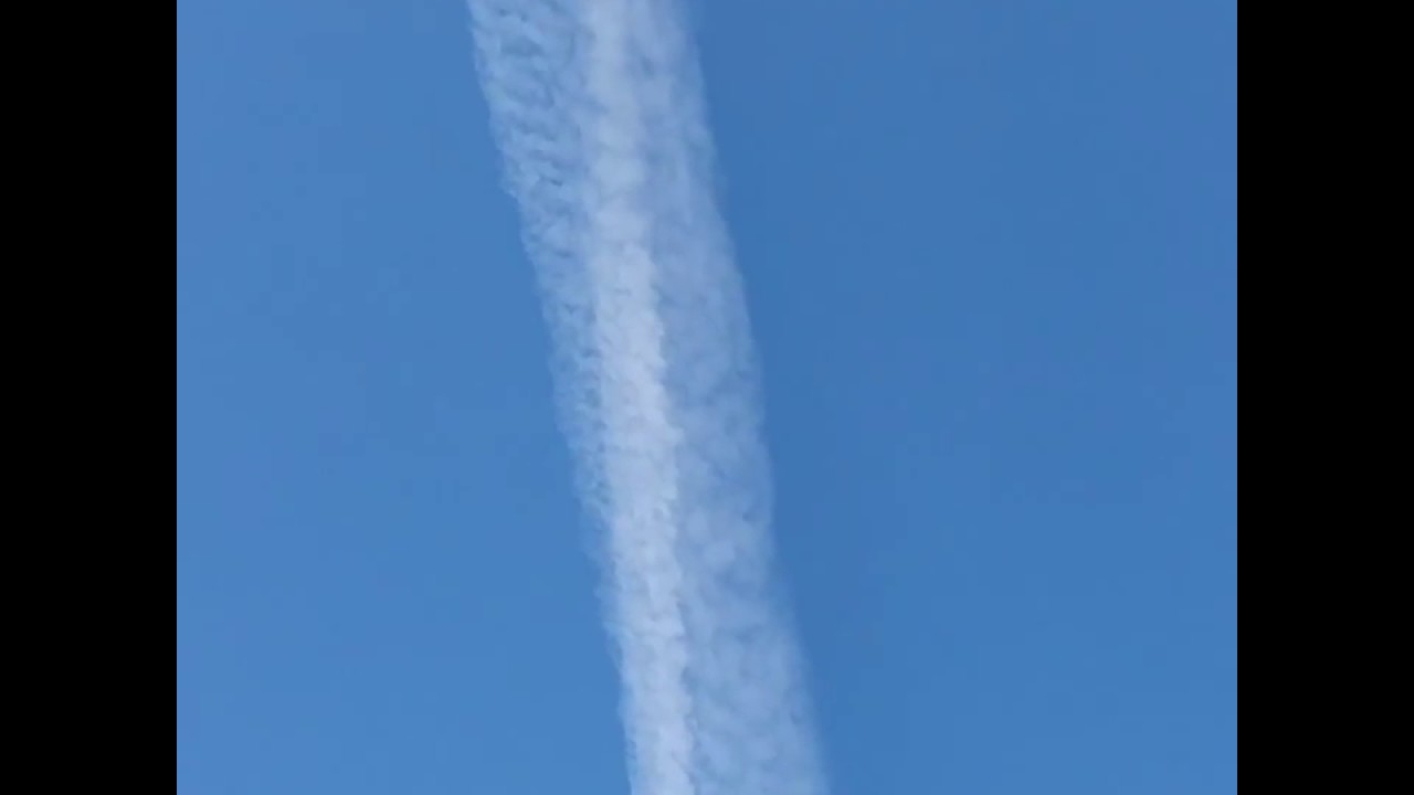 Strange Contrails Casting Shadows - YouTube