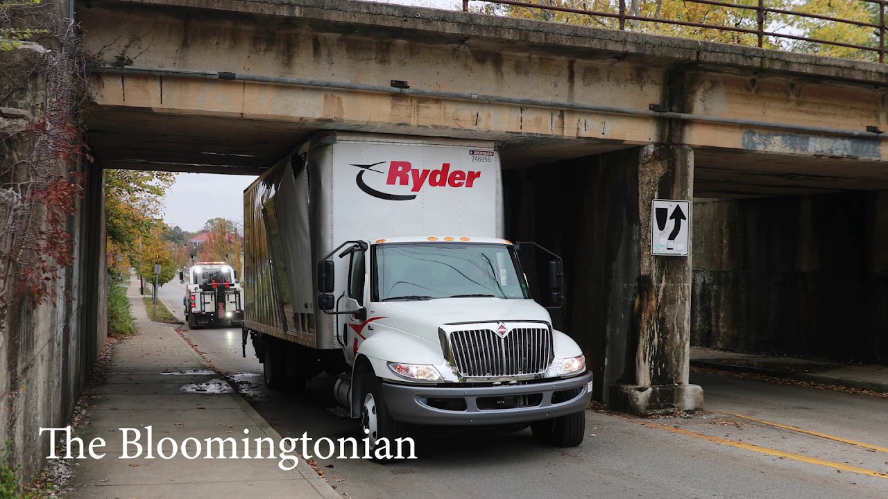 Ryder truck stuck under train bridge - YouTube