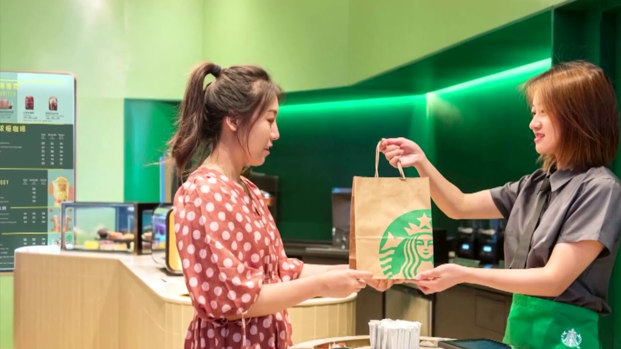 Starbucks CEO eyes 'walk-thru' stores in big cities - YouTube