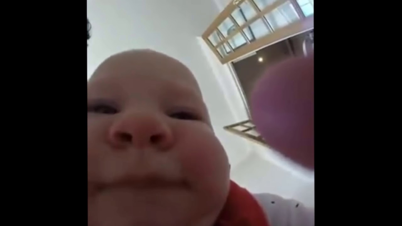 Baby eating camera but the other side is better - YouTube