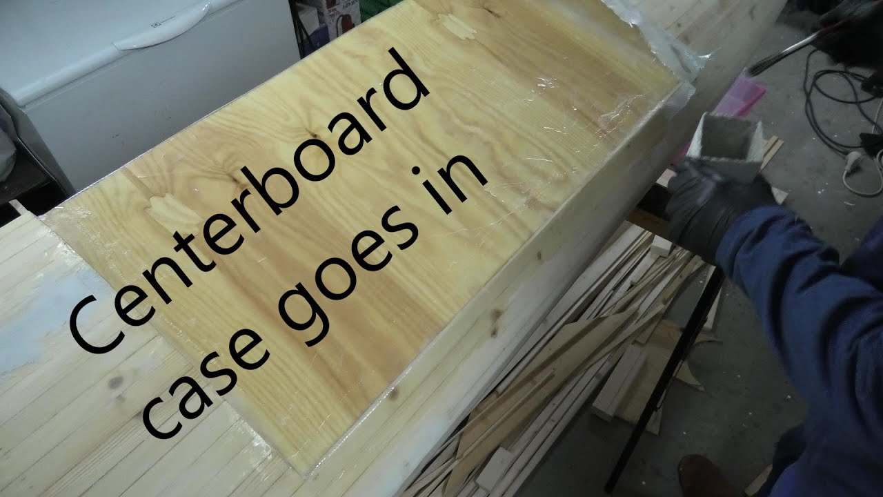 Gluing the centerboard case in place in the catamaran hull #300 - YouTube